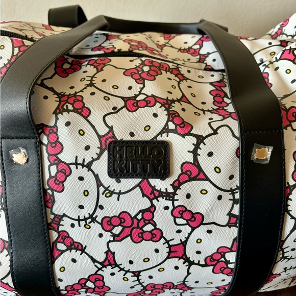 Hello Kitty | Bags | Hello Kitty Rolling Duffle Bag Luggage With Black ...